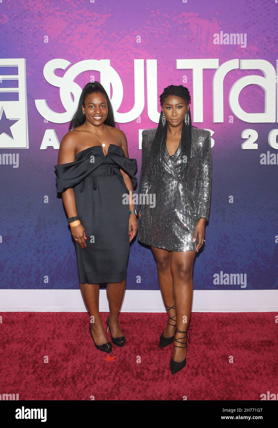 Denise Bailey Castro and Afia Genfi attend the 2021 SOUL TRAIN AWARDS ...
