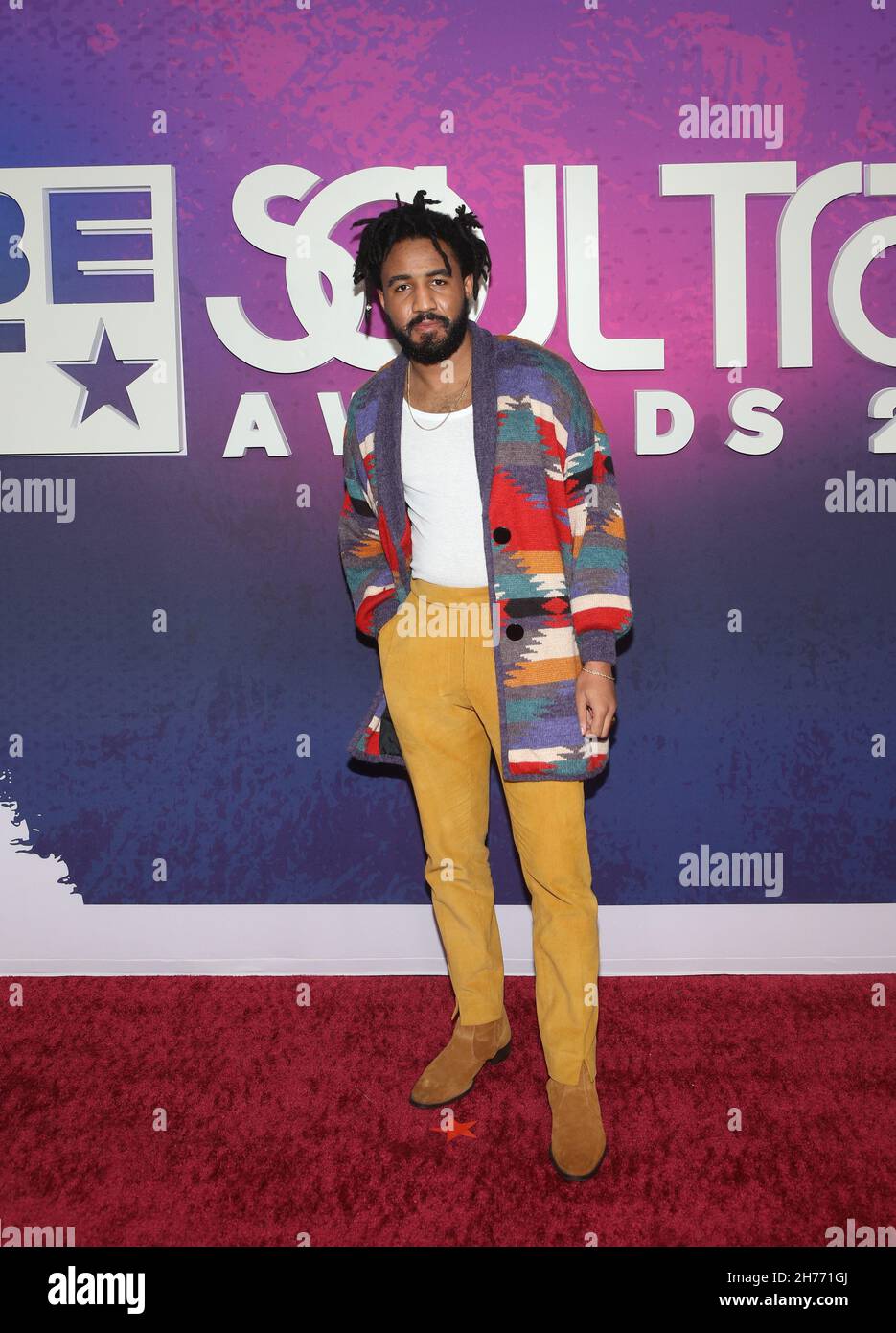 Deon Jones attends the 2021 SOUL TRAIN AWARDS arrivals red carpet at ...