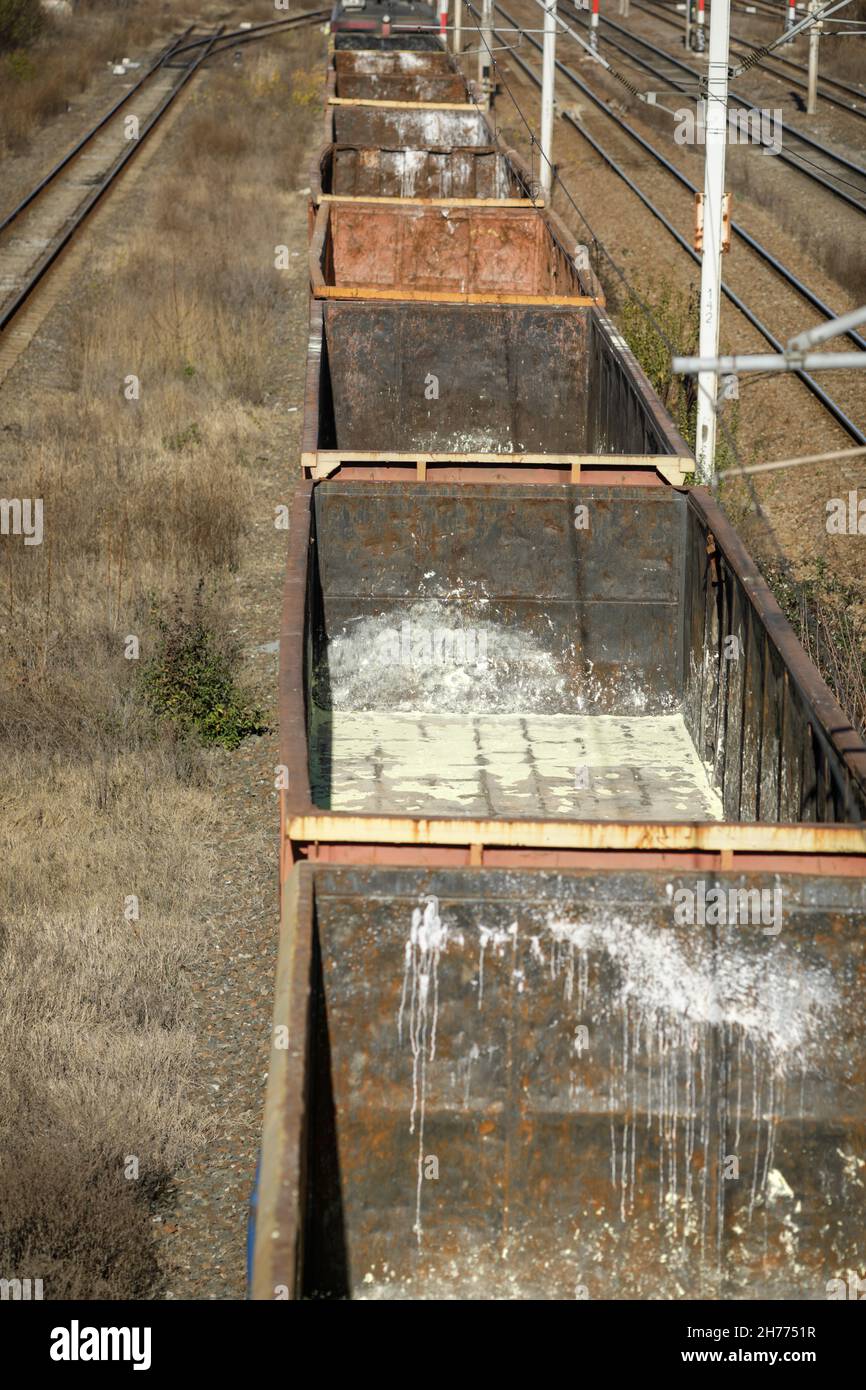 Empty old freight train wagons and in a station Stock Photo - Alamy