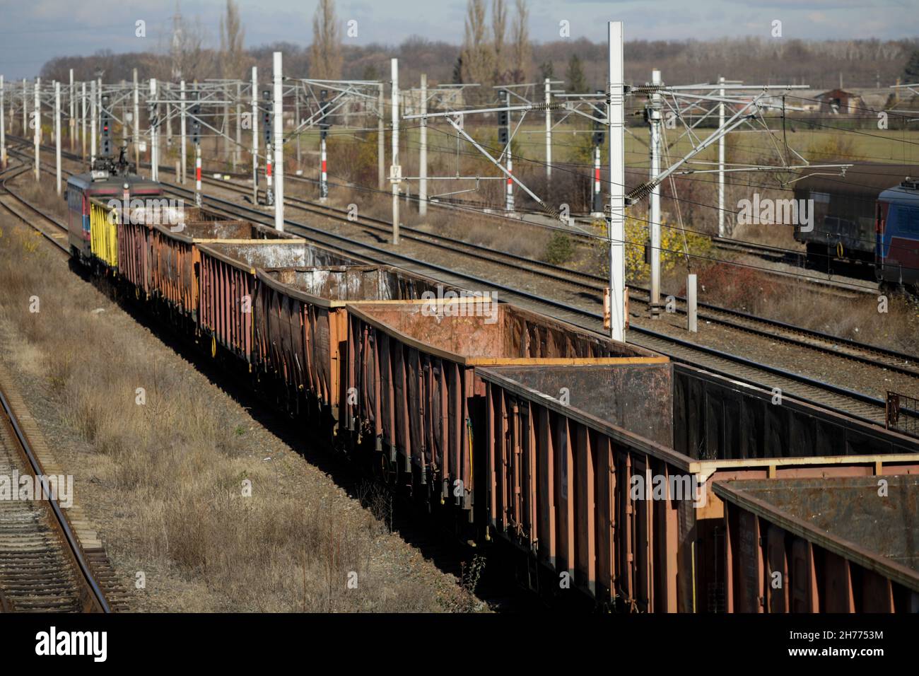 Empty old freight train wagons and in a station Stock Photo - Alamy