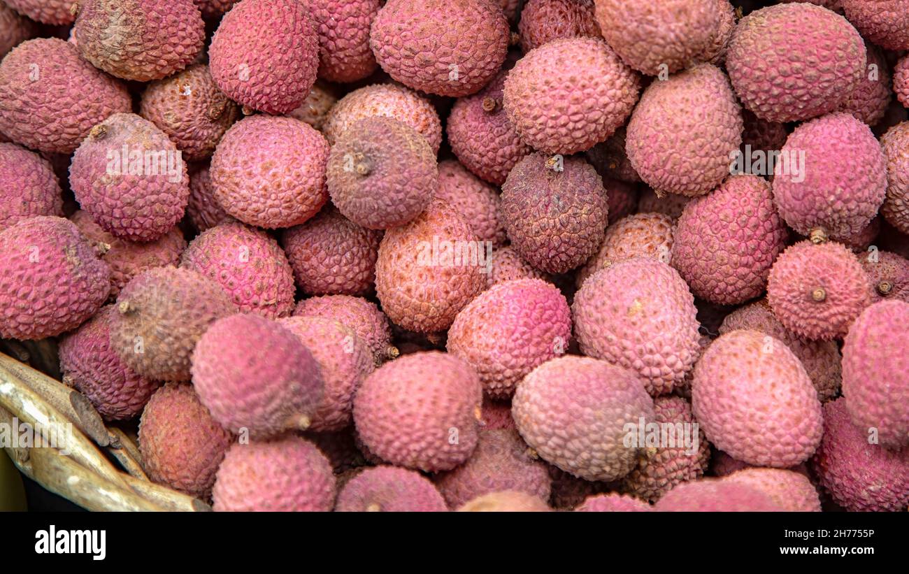 Fresh Lychee fruit in a basket Stock Photo - Alamy