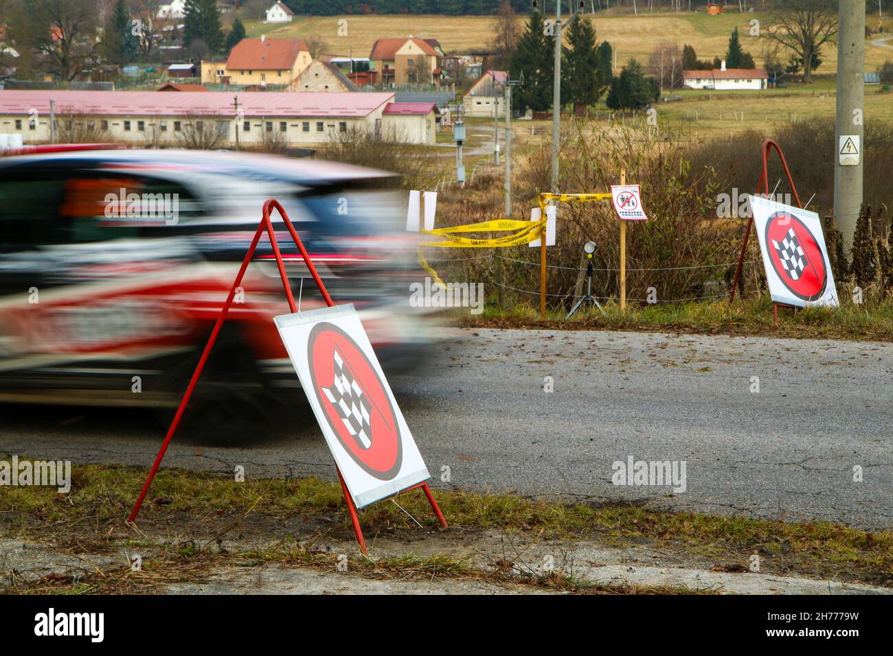 The rally racing car arriving to the finish line of the speed stage ...