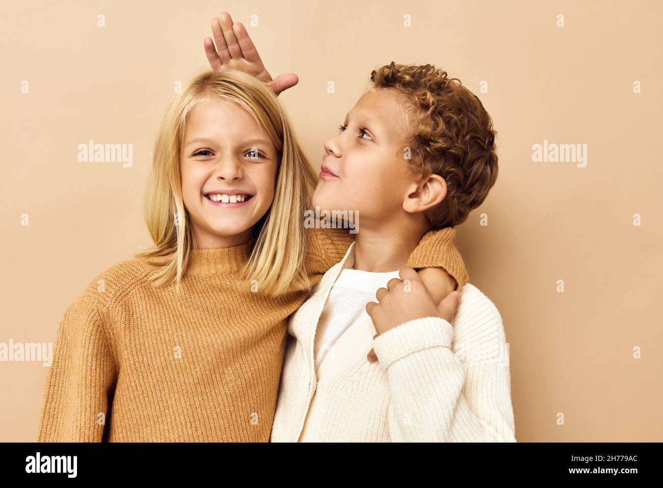 portrait of cute children hug games smile friendship Studio emotions ...