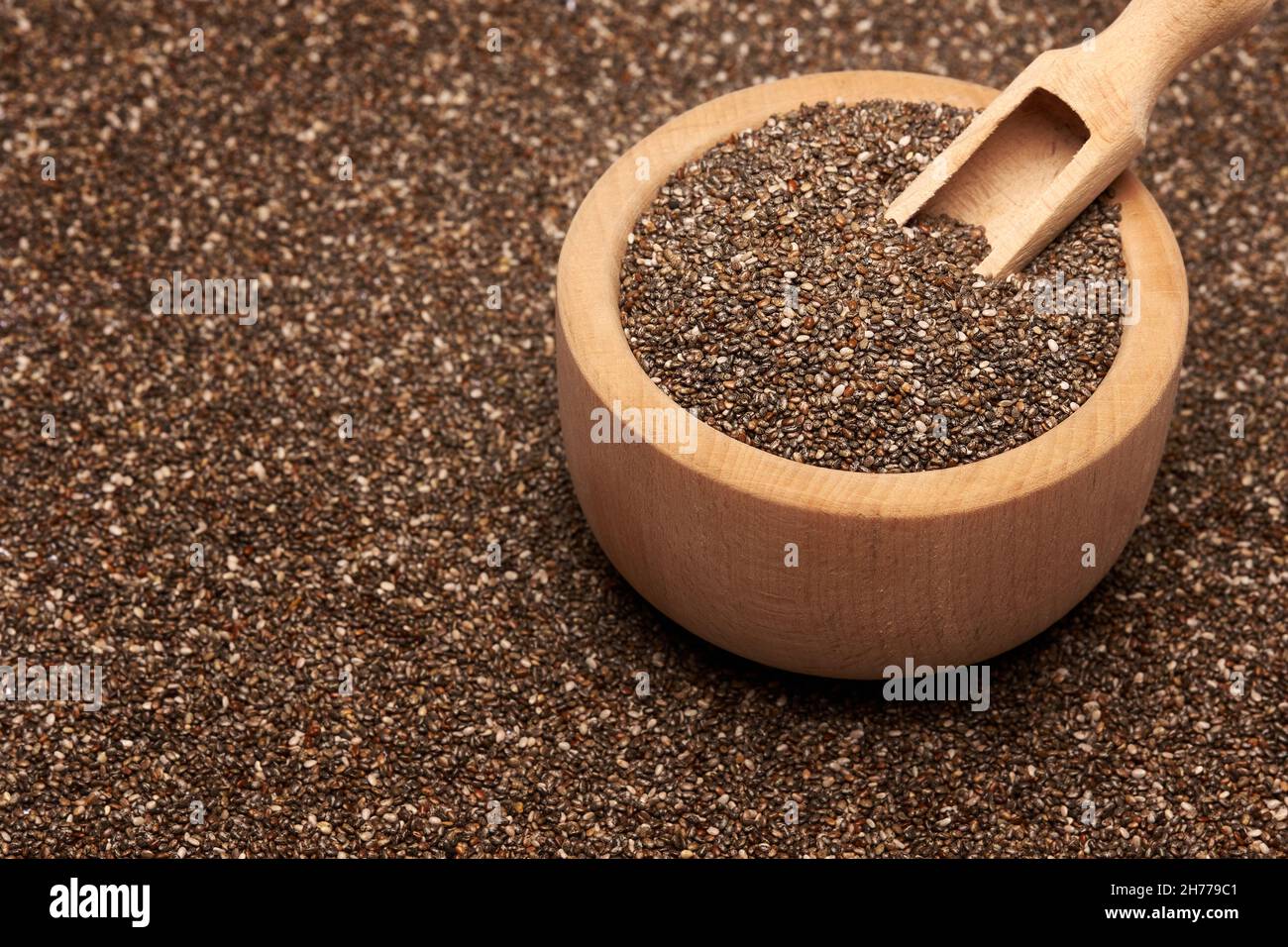 Organic natural chia seeds, wooden scoop and bowl close-up Stock Photo ...