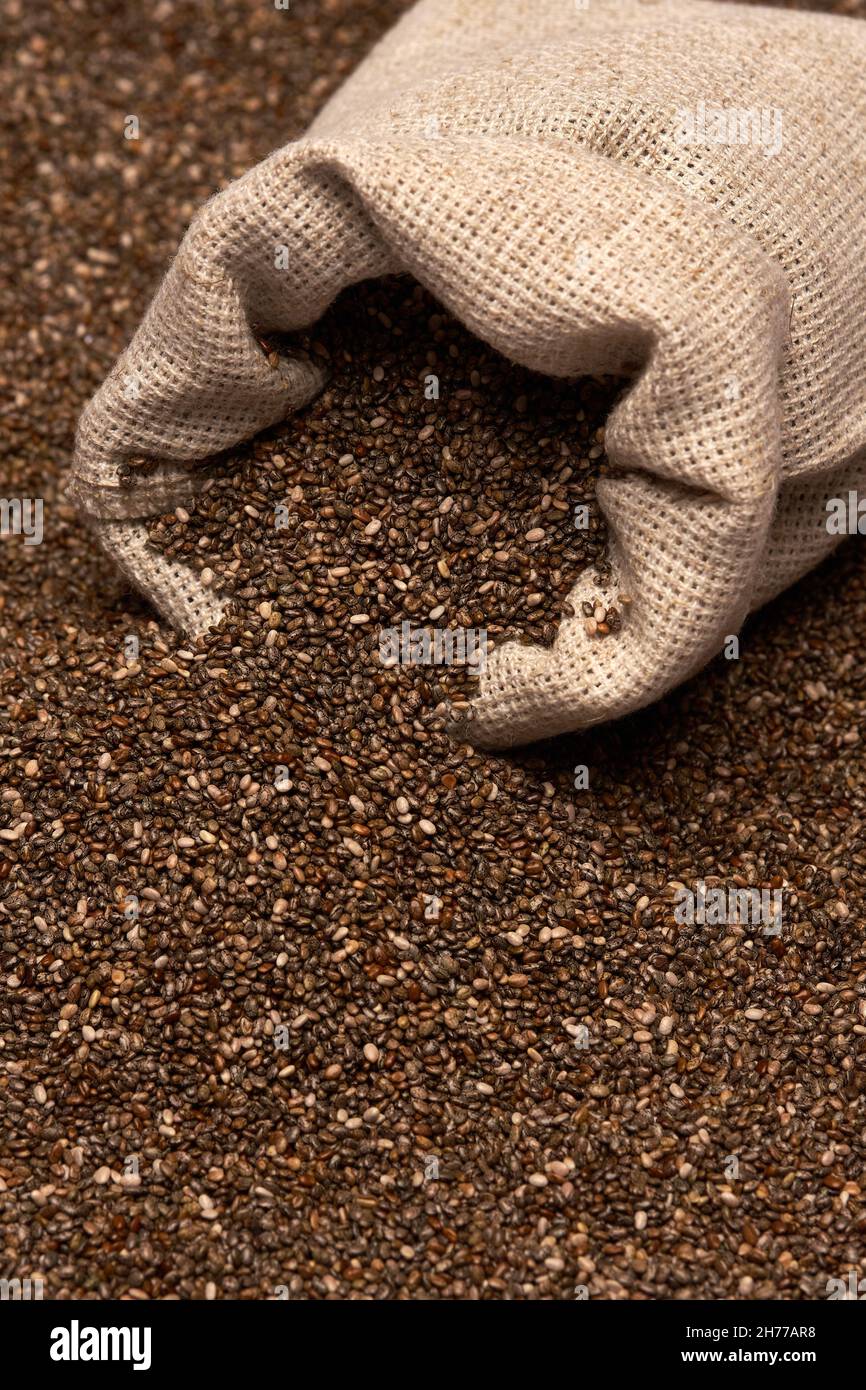 Organic natural chia seeds and burlap sack close-up Stock Photo - Alamy