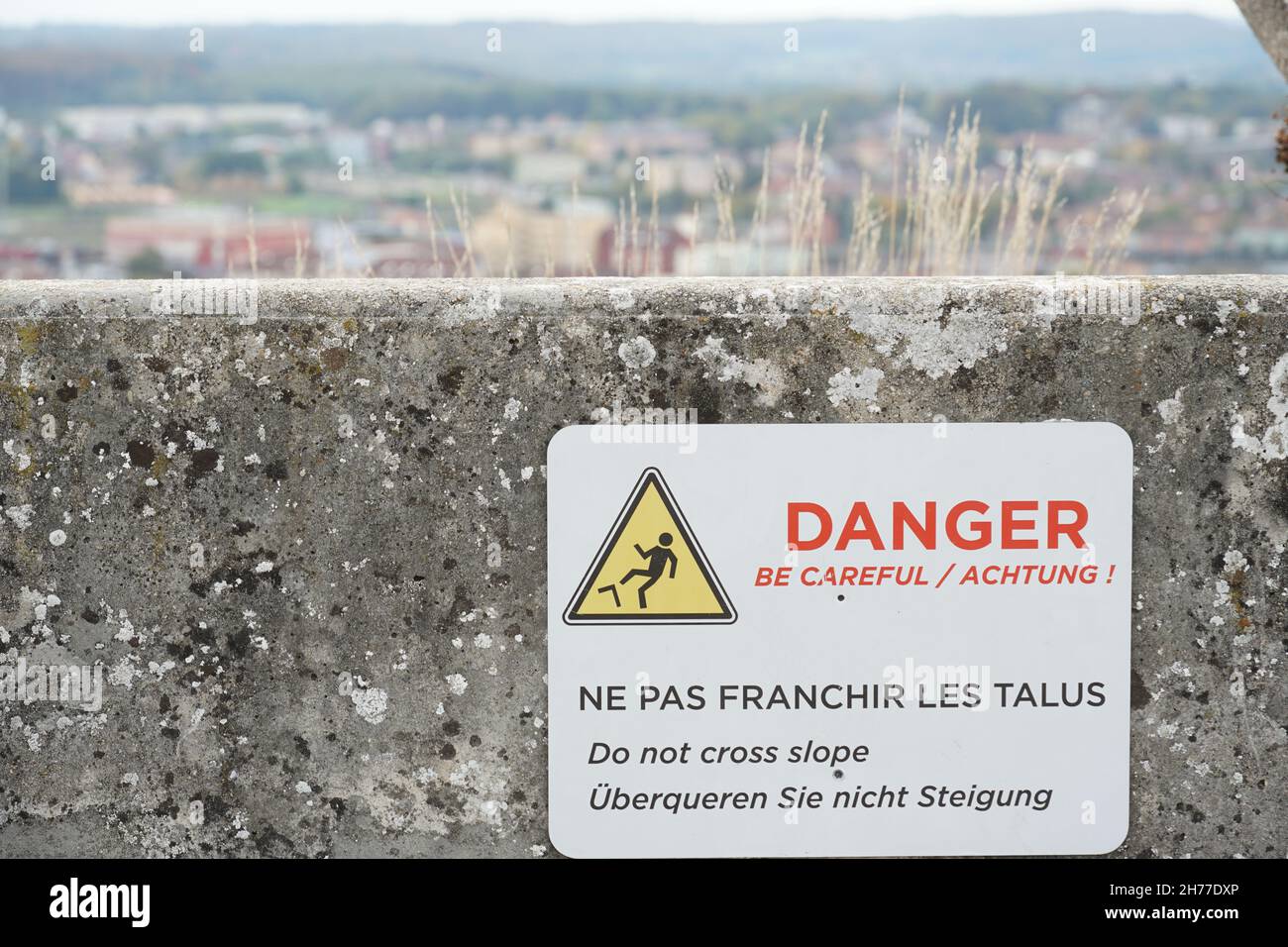 Warning sign to prevent tip over, overturn, in English, German and ...