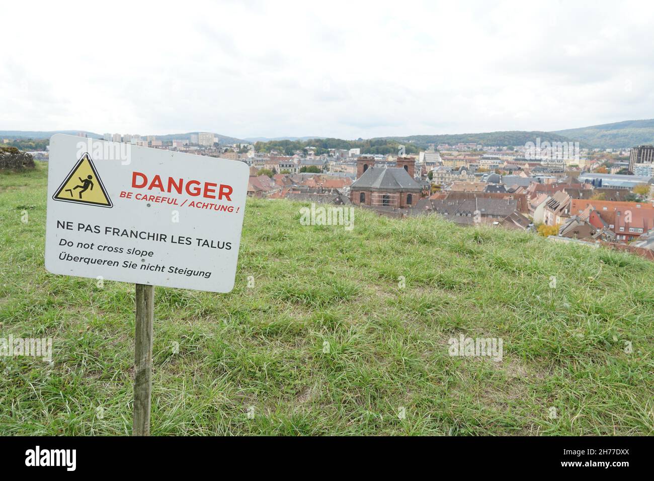 Warning sign to prevent tip over, overturn, in English, German and ...