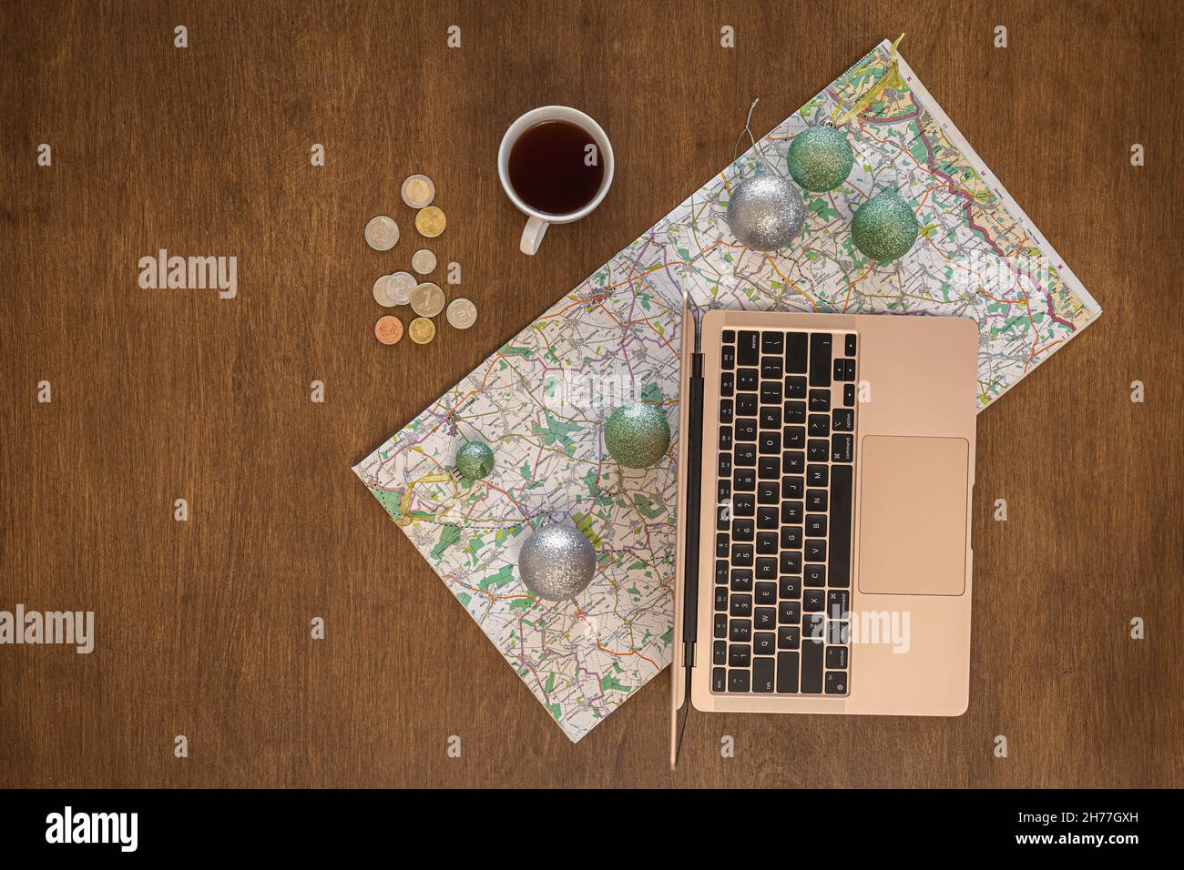 Planning a trip laptop map hi-res stock photography and images - Alamy