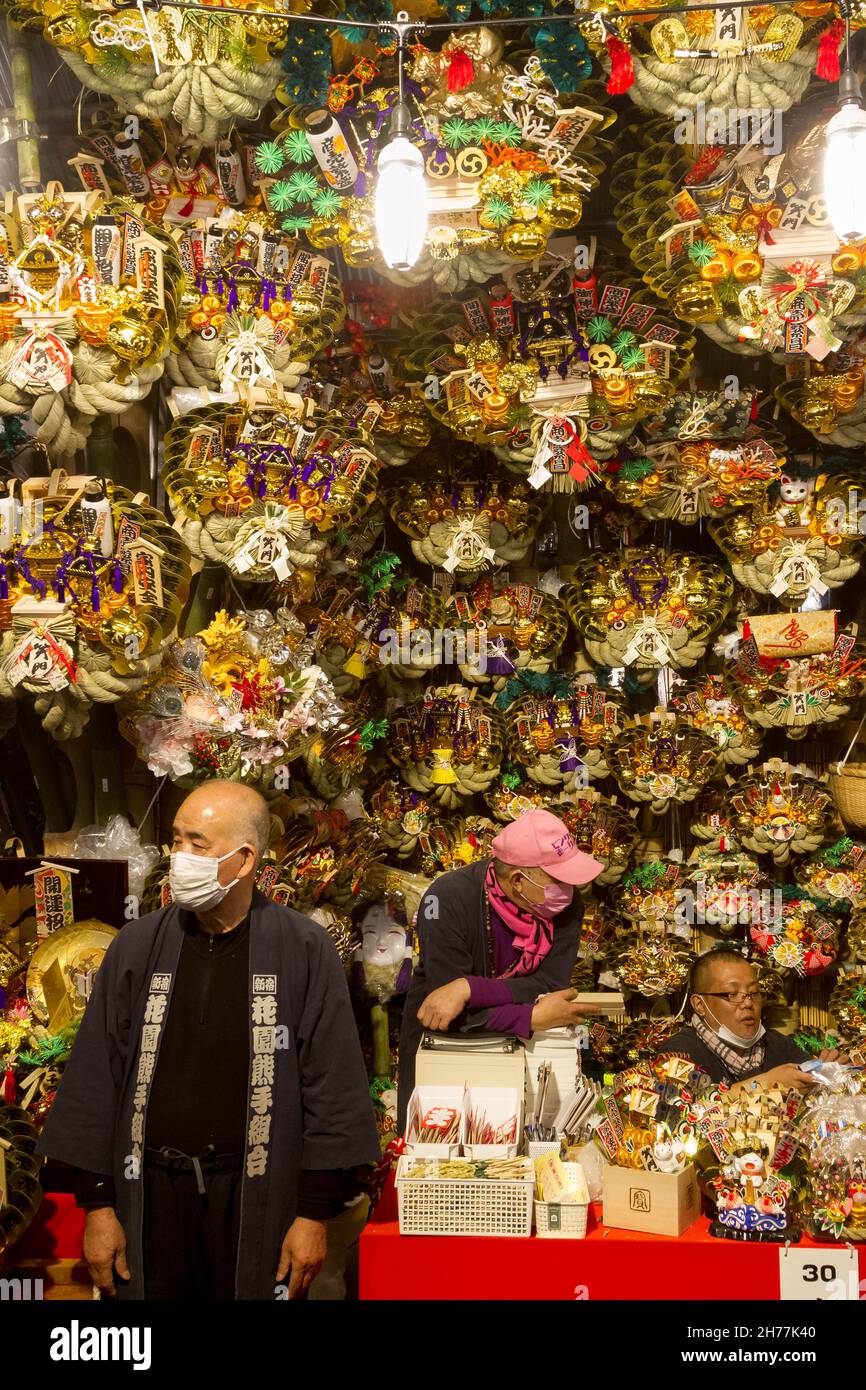 Kumade (rake) stall holders seen at the Tori no Ichi or Cock festival ...
