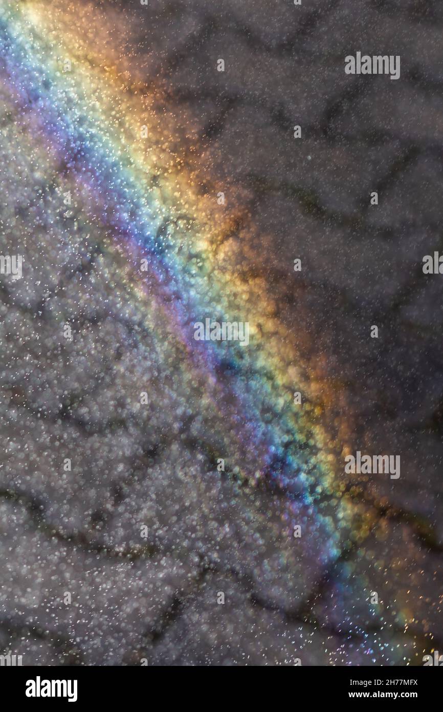 The vertical shot of rainbow from waterdrops Stock Photo - Alamy