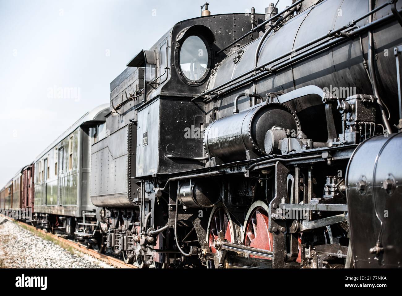 A steam train at a station Stock Photo - Alamy