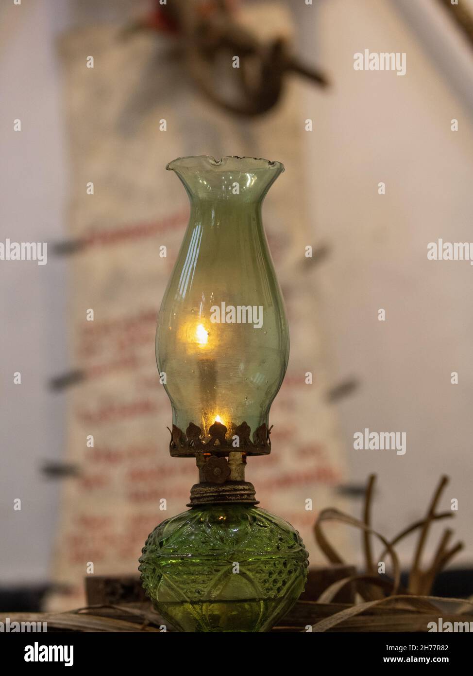 A vertical of the burning kerosene lamp in the house Stock Photo - Alamy