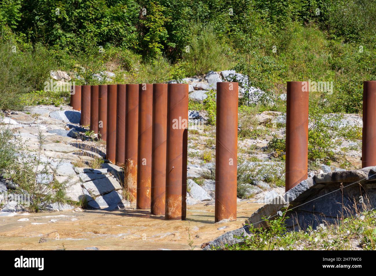 Rake for holding back big pieces of wood during a flood, also called ...