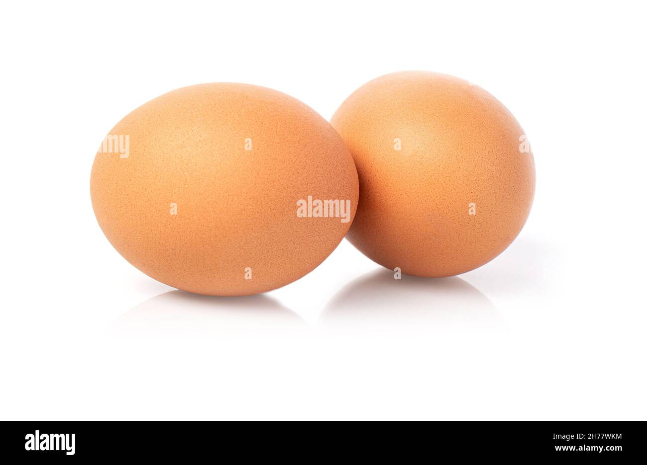two eggs isolated on white background Stock Photo - Alamy