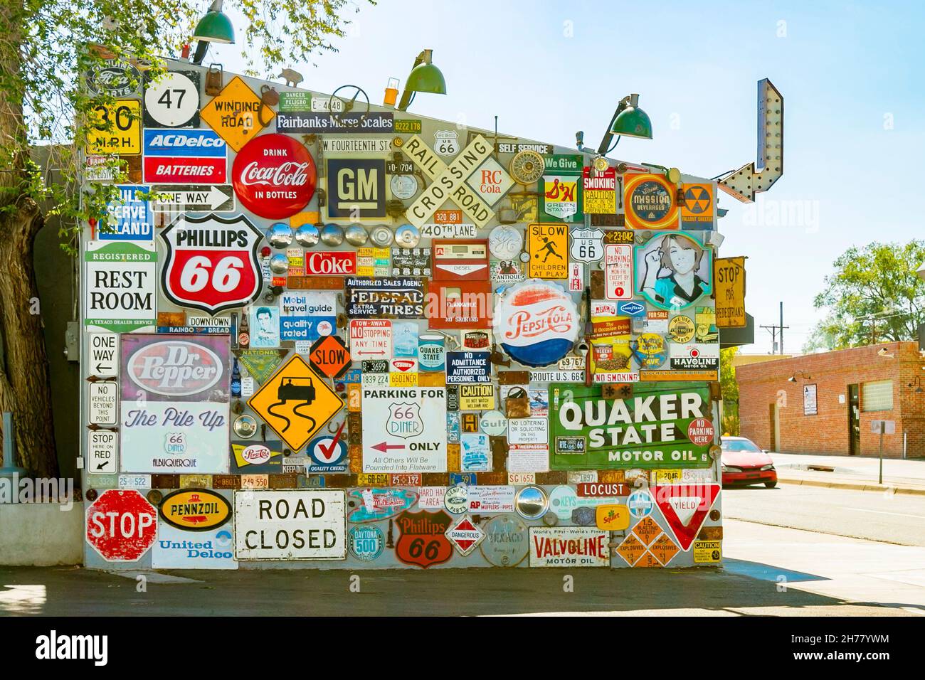 a wall of iconic vintage signs on the famous Route 66 Central Avenue ...