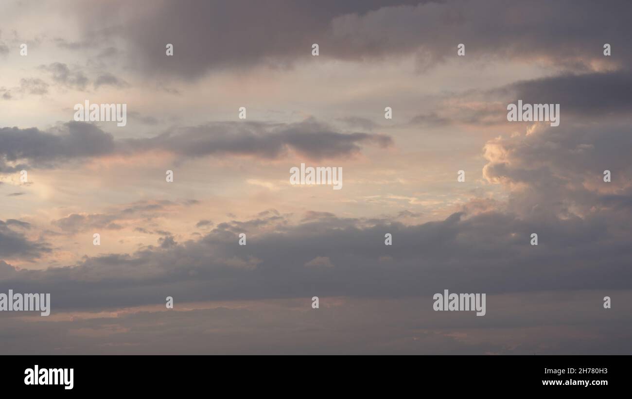 Sunset or sunrise cloudscape with clouds backlit, background Stock ...