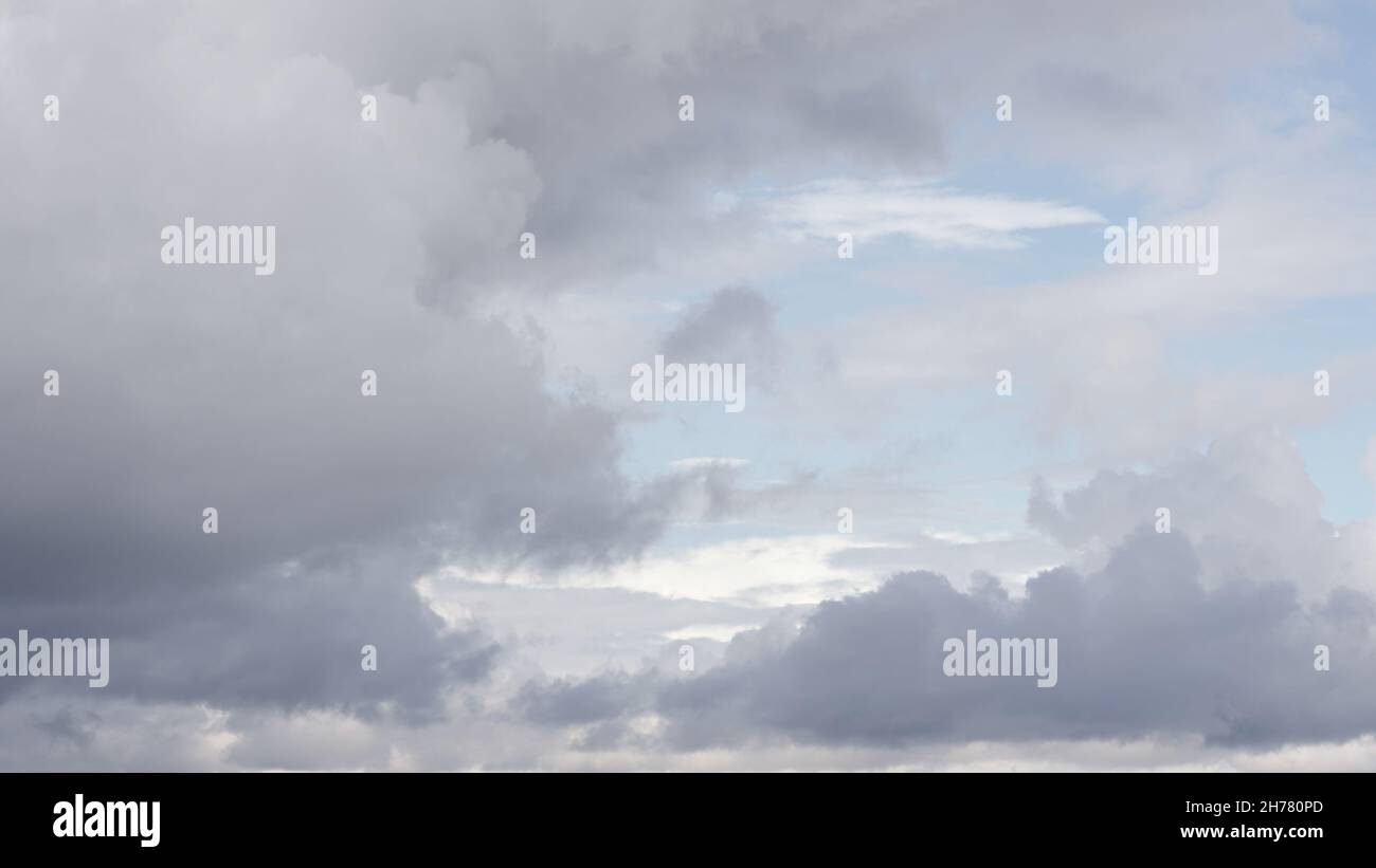 Storm rain clouds slowly drifting on sky, nature background Stock Photo ... Storm rain clouds slowly drifting on sky, nature background Stock Photo ...
