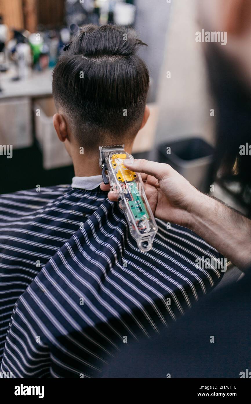 Person using hair clipper hi-res stock photography and images - Alamy