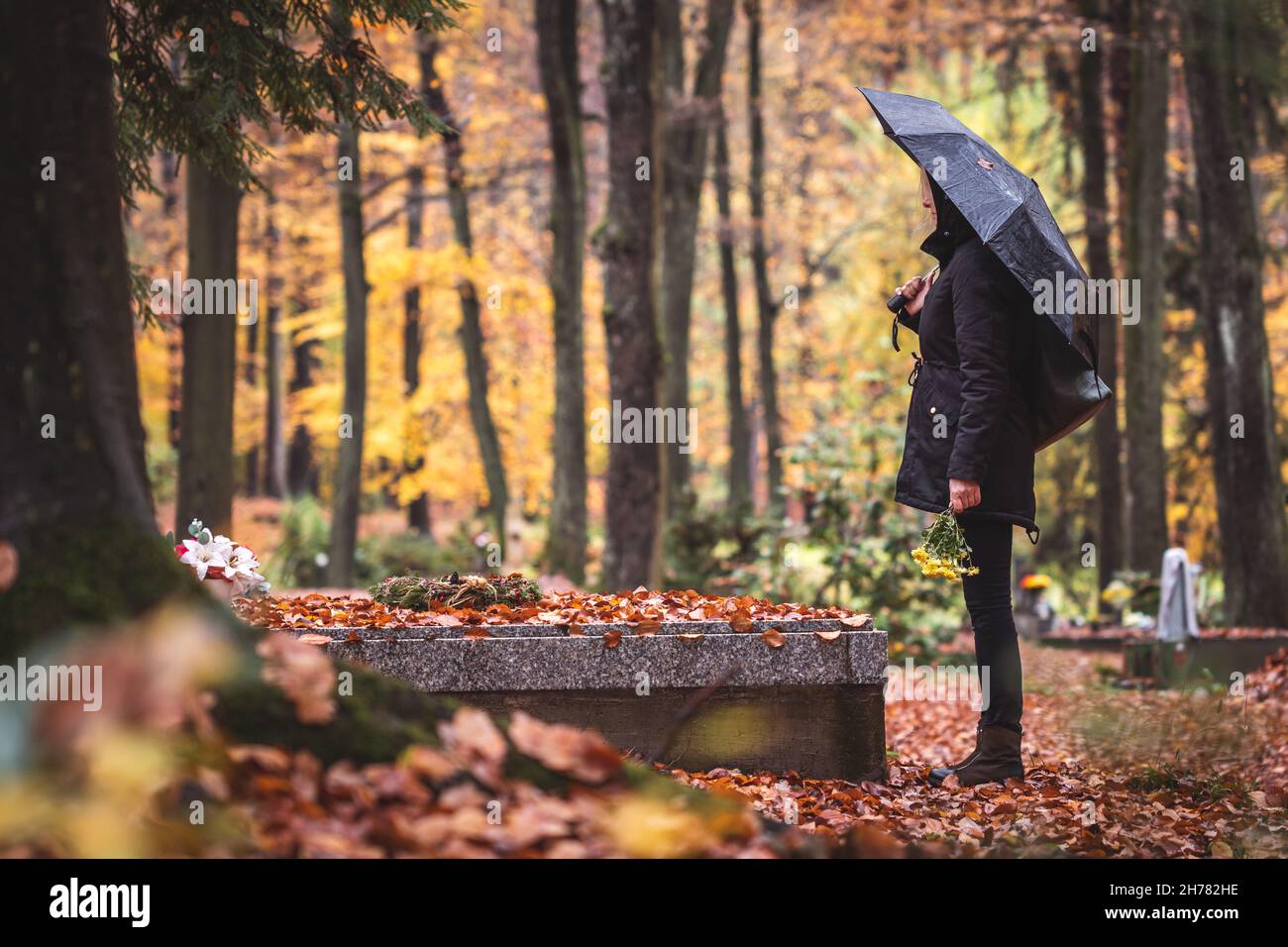 Standing crying death grief praying memories hi-res stock photography ...