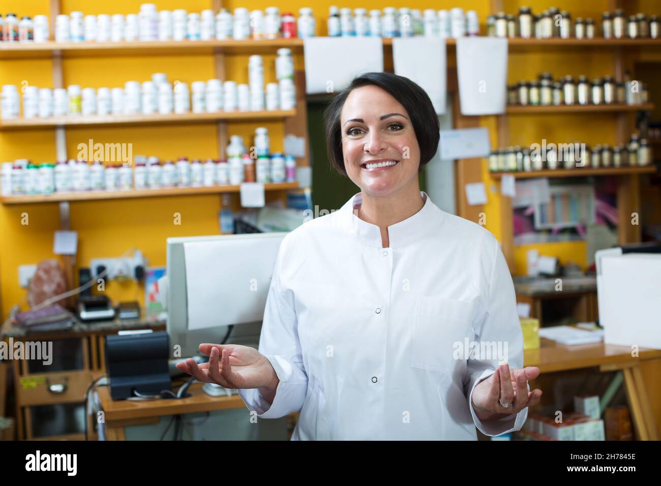 Female pharmacist in store Stock Photo - Alamy