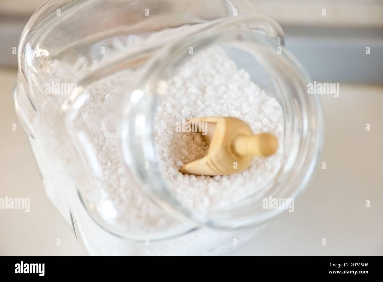 Salt crystals in a transparent glass jar Stock Photo - Alamy