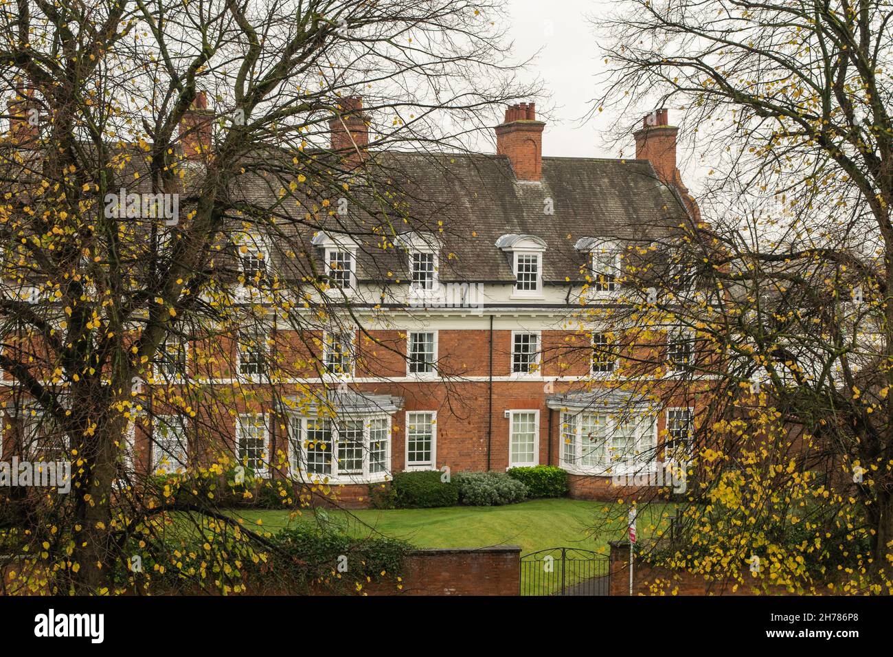 Facade of luxurious British terraced houses with lawn in York England ...