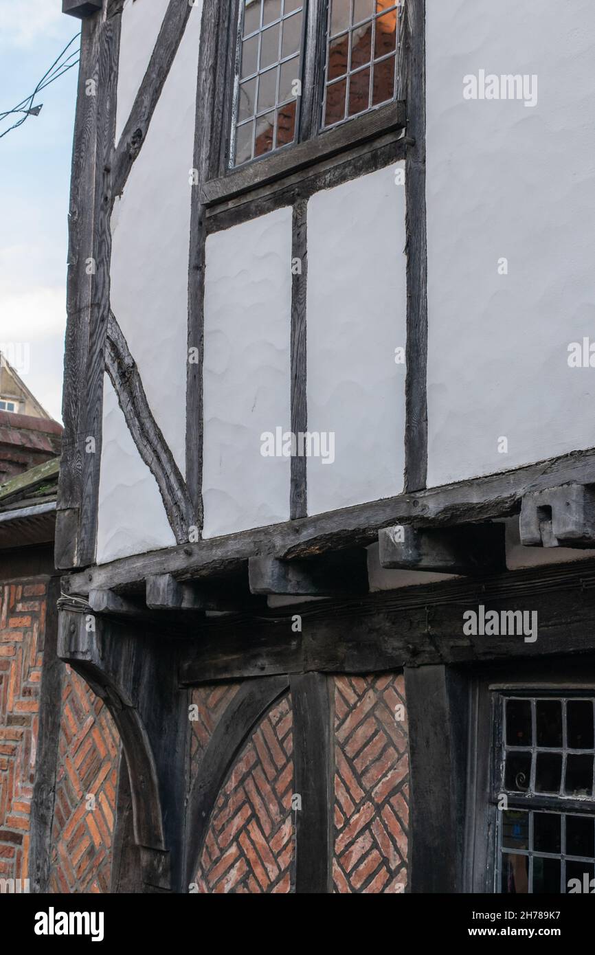 Facade of Tudor architecture house and supporting beams in York England ...
