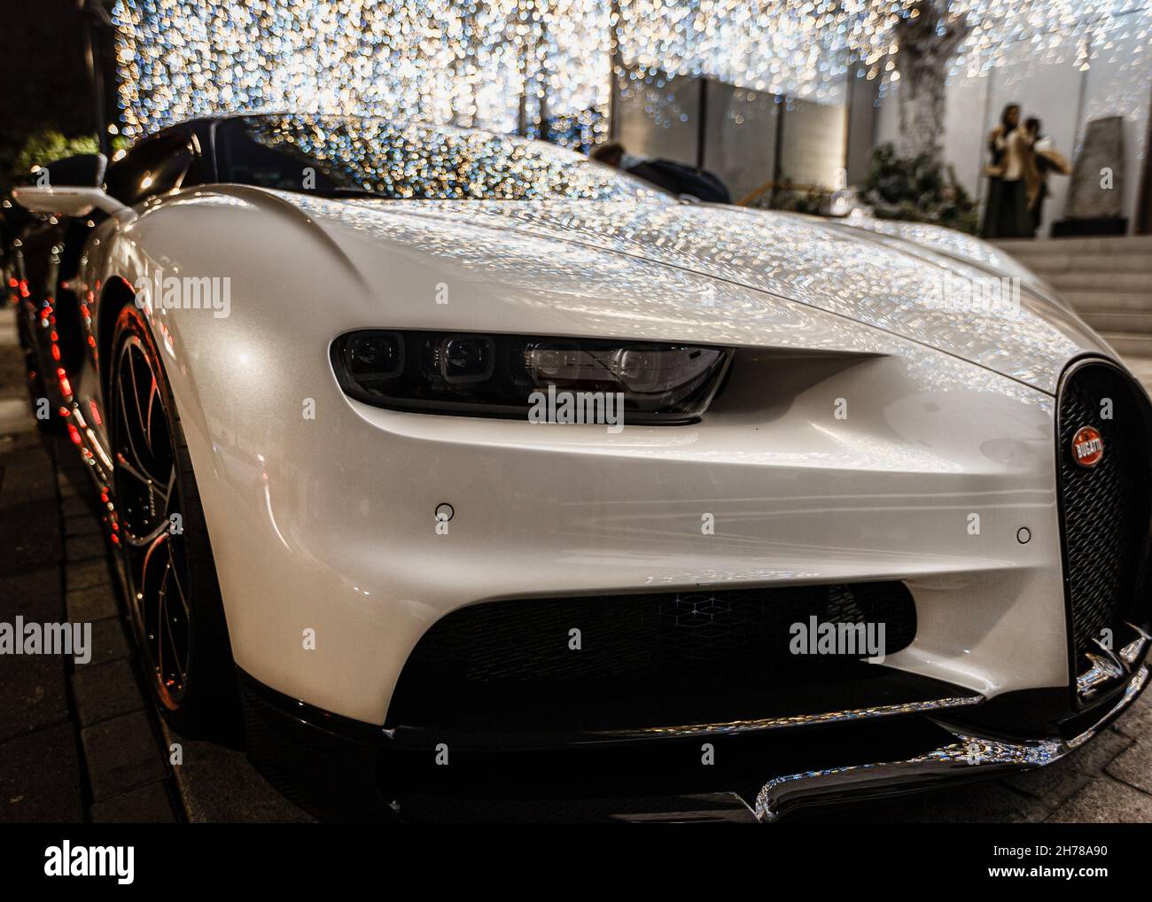 A Bugatti supercar under Christmas lights in Knightsbridge, London ...