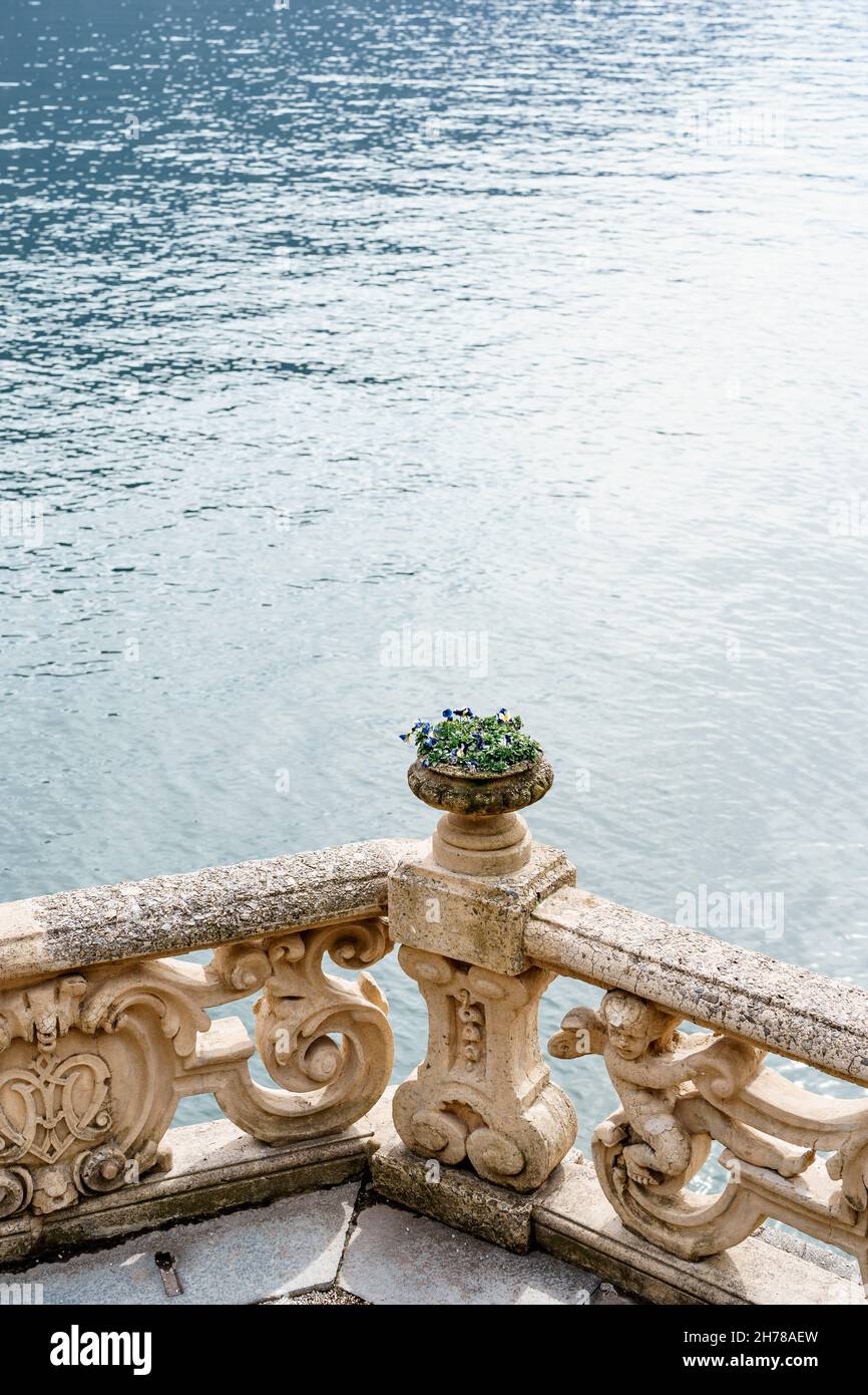 Carved balustrade with sculptures and patterns on the balcony of Villa ...