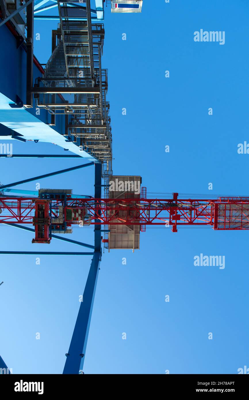 Cranes of container terminal cose up in industrial sea port. industrial ...