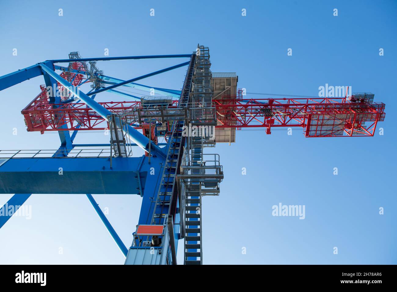 Cranes of container terminal cose up in industrial sea port. industrial ...