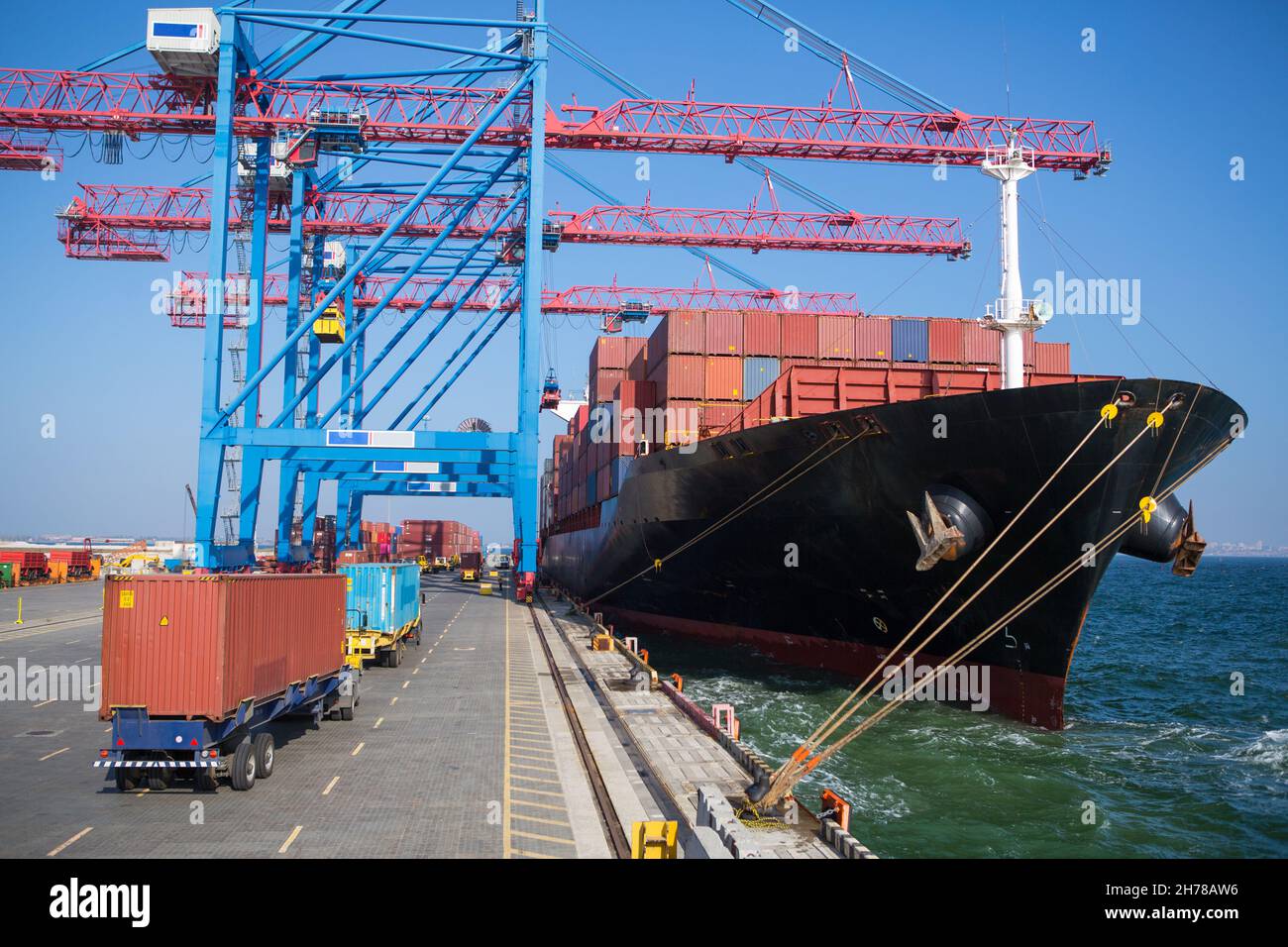 Container ship in port at container terminal. Ships of container ships ...