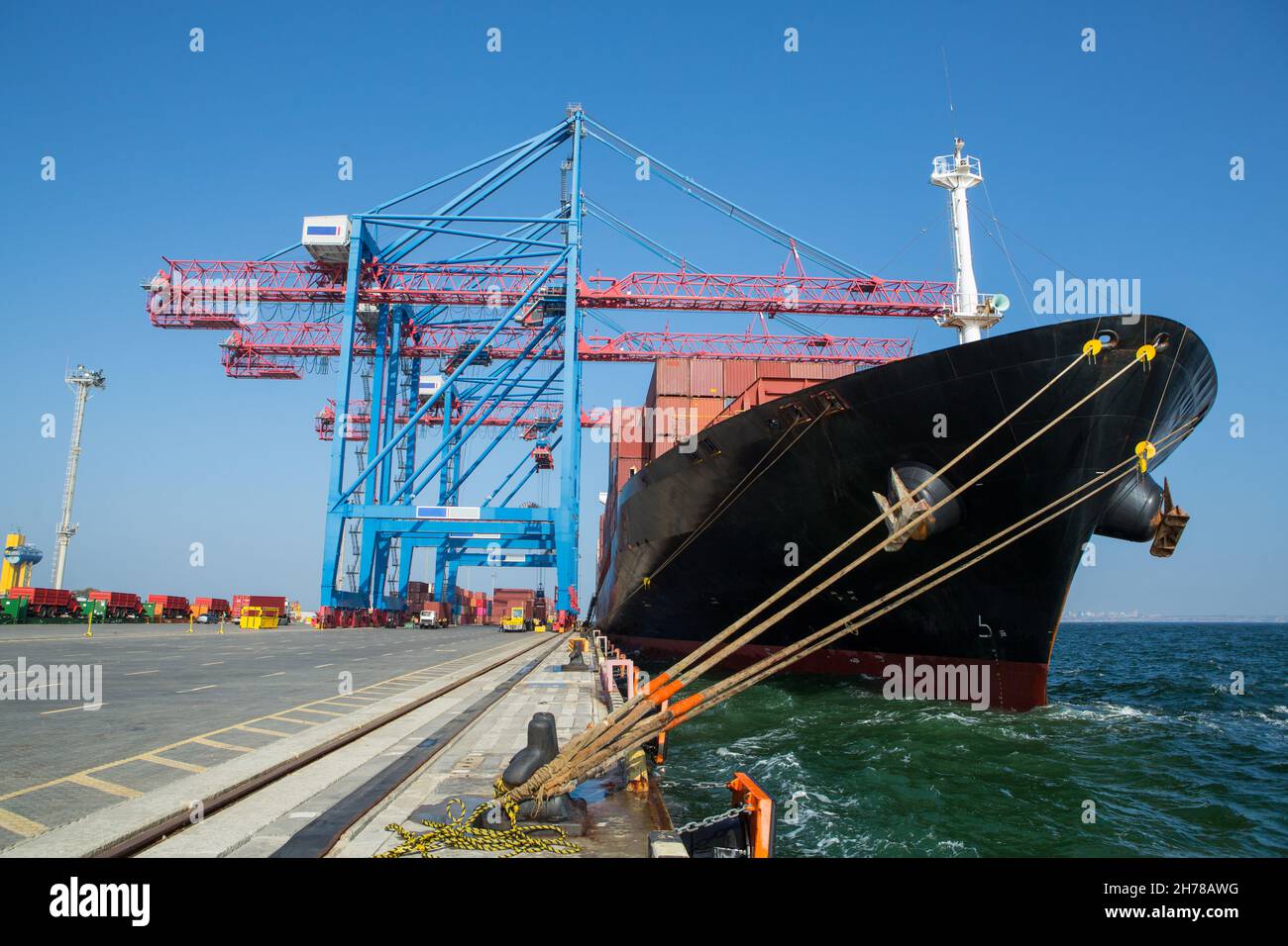 Container ship in port at container terminal. Ships of container ships ...