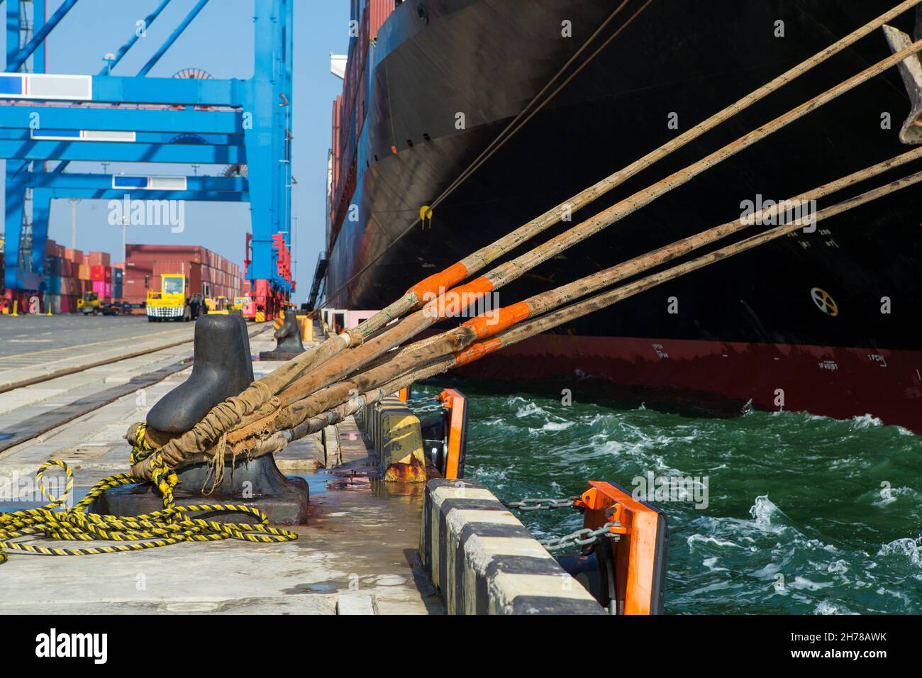 Container ship in port at container terminal. Ships of container ships ...