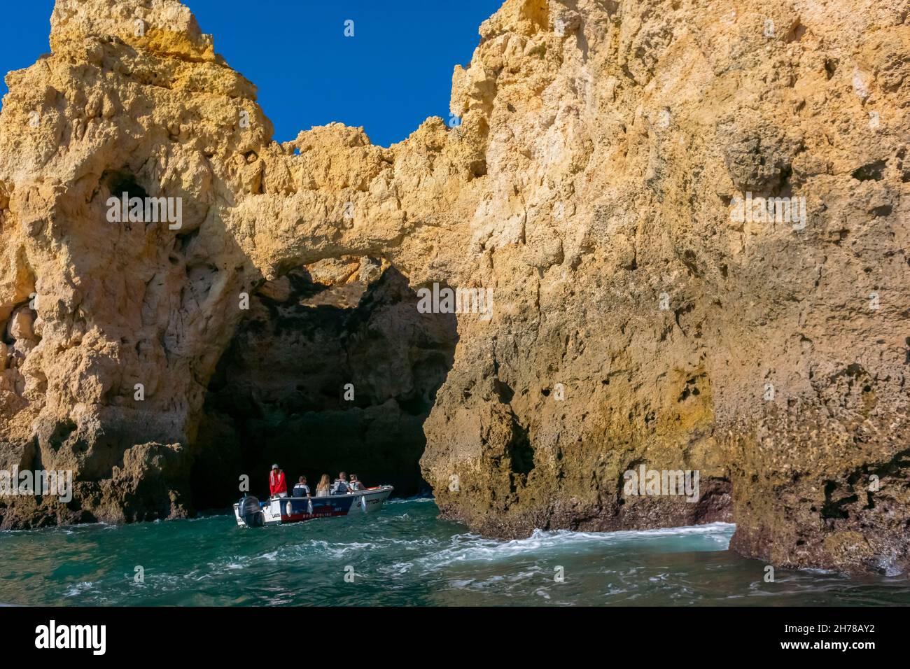 Lagos, Portugal, Group Tourists visiting in Tour Boat, Caves, Atlantic ...