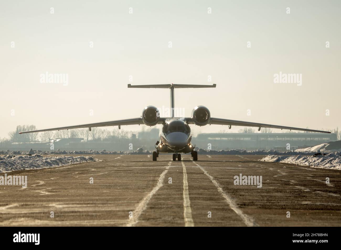 Cargo plane in the winter on the runway. Cargo plane at the airport ...