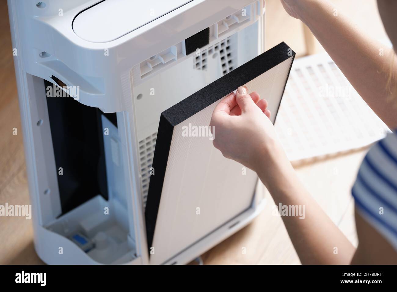 Woman changing filter in hi-res stock photography and images - Alamy