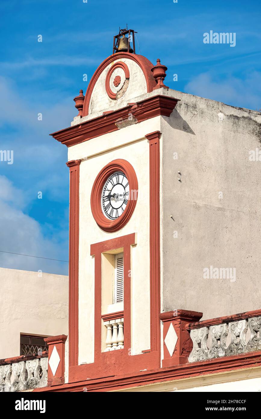 Clock tower building of Artex, Holguin, Cuba Stock Photo - Alamy