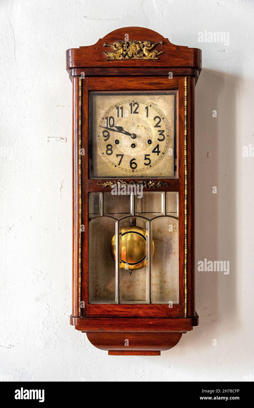 Antique wall clock with pendulum, Casa Consistorial, Holguin, Cuba ...