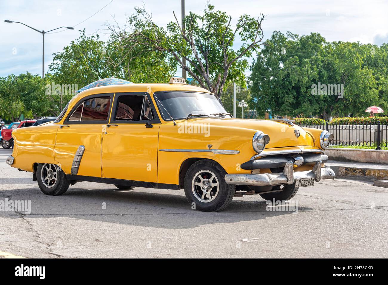 Vintage yellow Ford car driving in the city centre Nov. 21, 2021 Stock ...