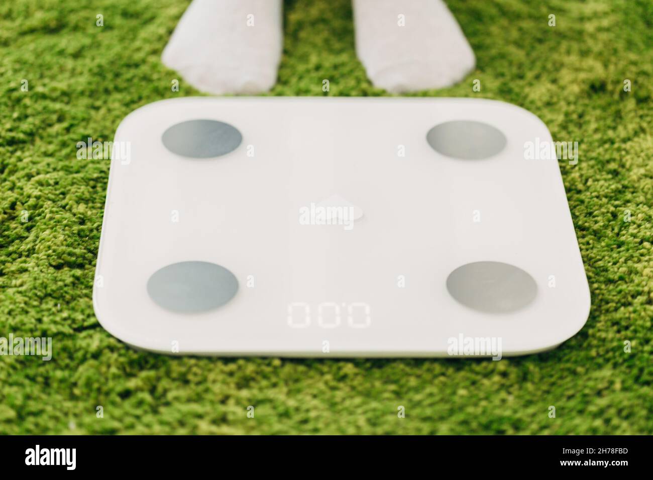 Girl Measures Weight During Diet. Smart Scales for Home Stock Photo - Alamy
