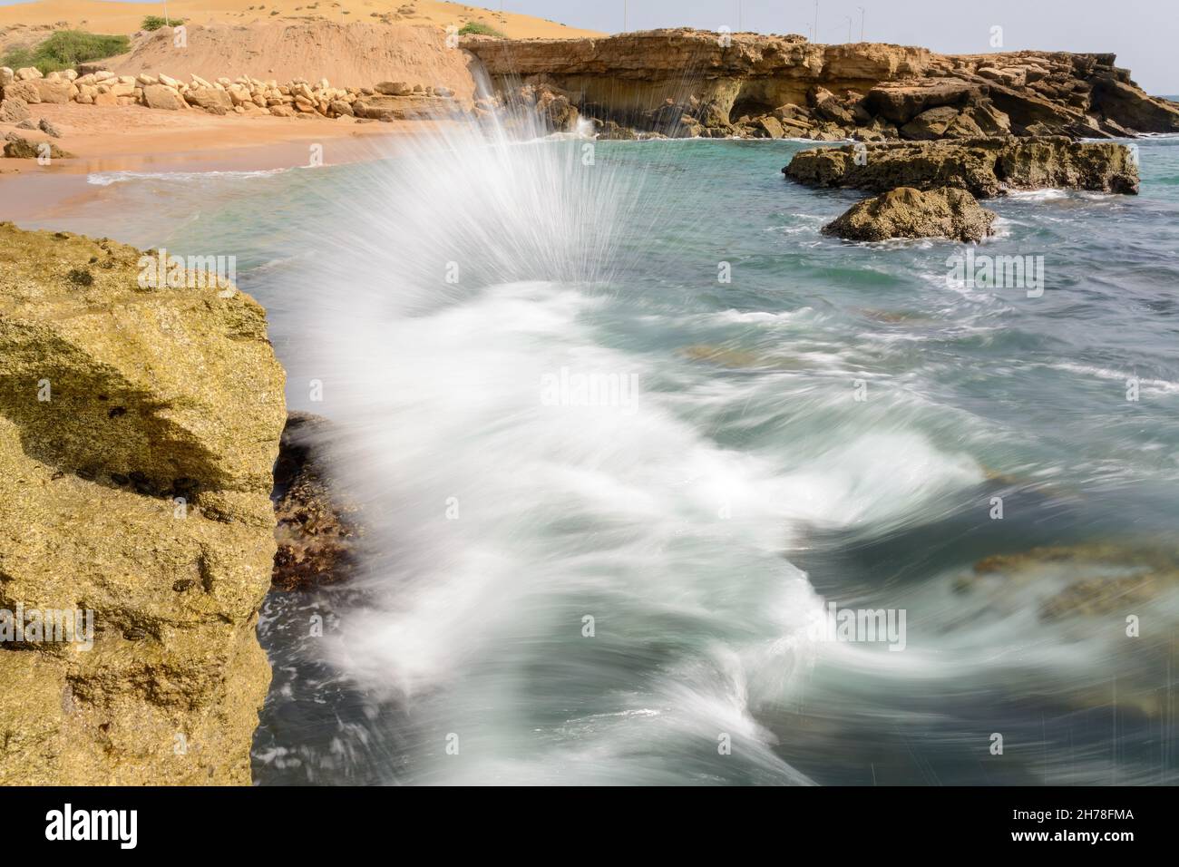 long exposure shot from the waves in the beach of Chabahar at sunset ...