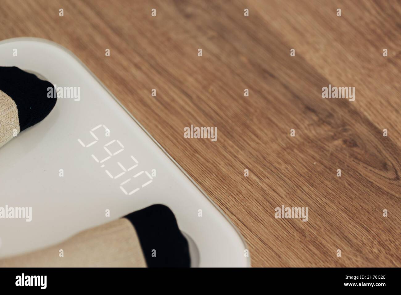 Girl Measures Weight on Smart Scales. Modern Electronic Device Stock ...