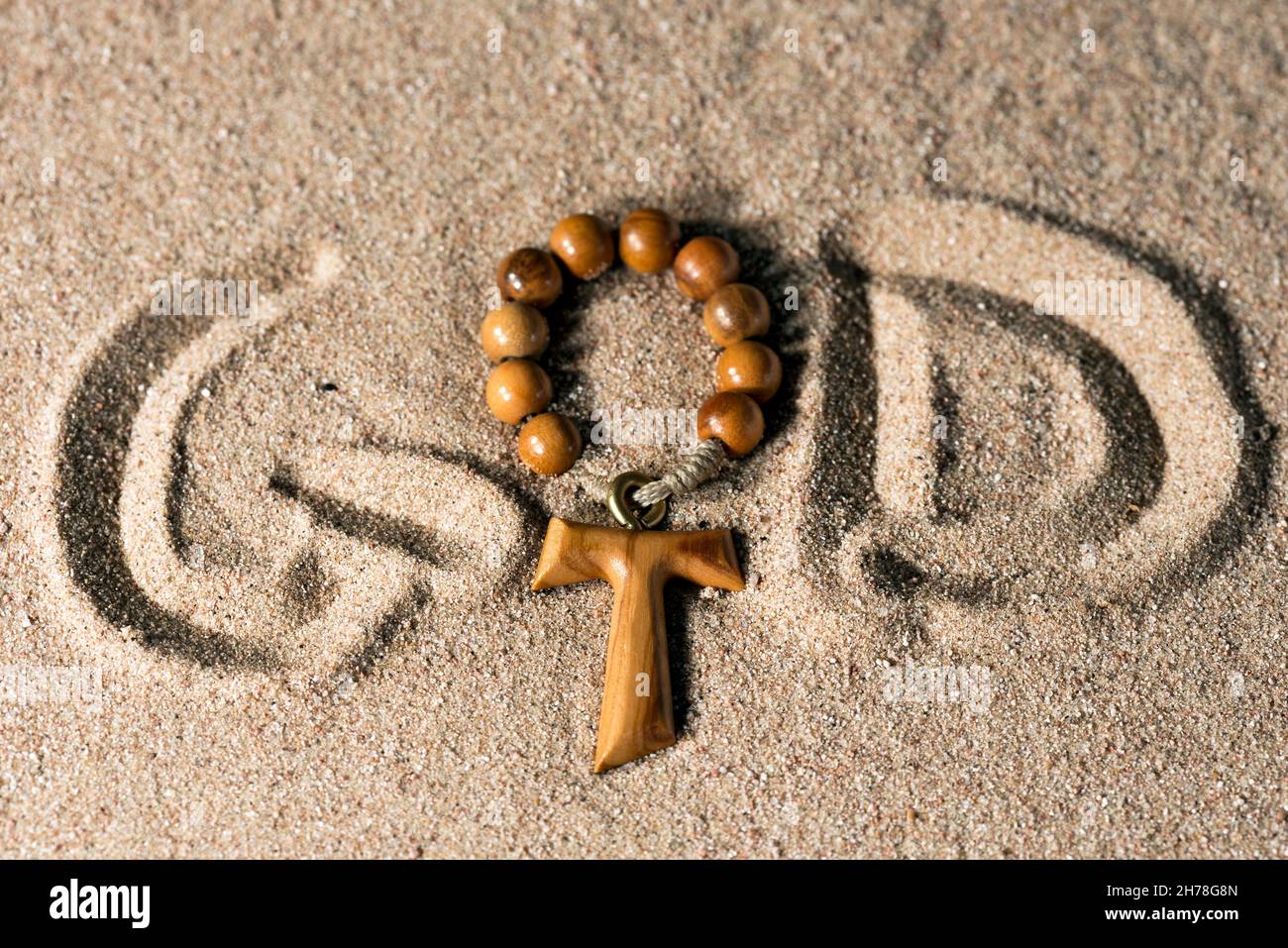 Tau, wooden cross in the shape of the letter t with rosary bead and the ...