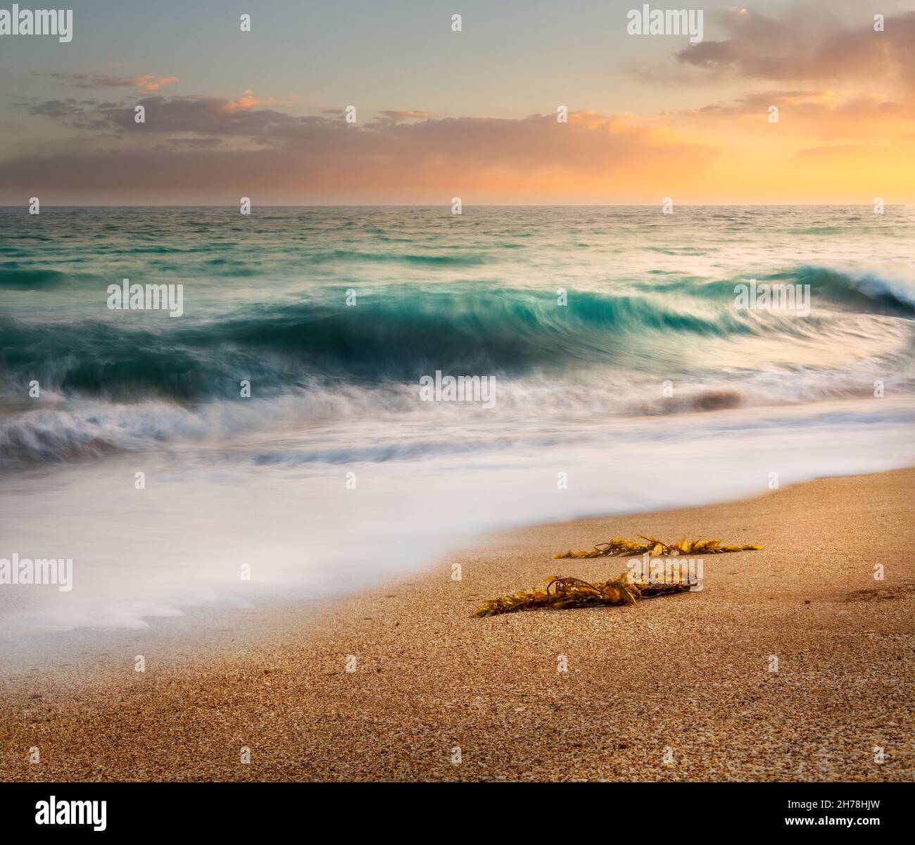 long exposure shot from the waves in the beach of Chabahar at sunset ...