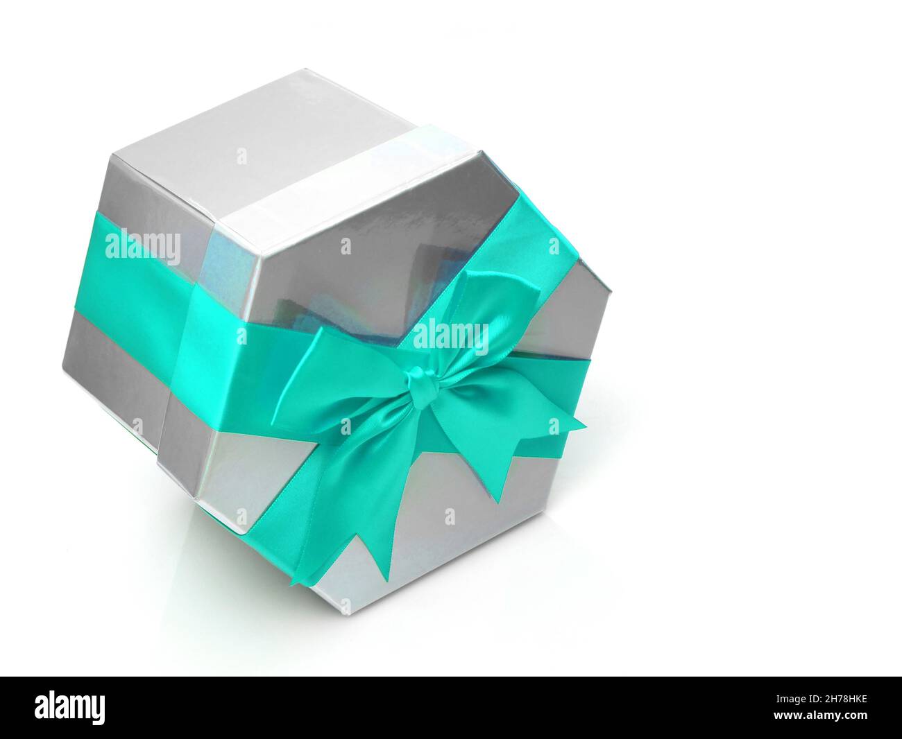 Silver gift box with mint green satin bow. Isolated on white background ...
