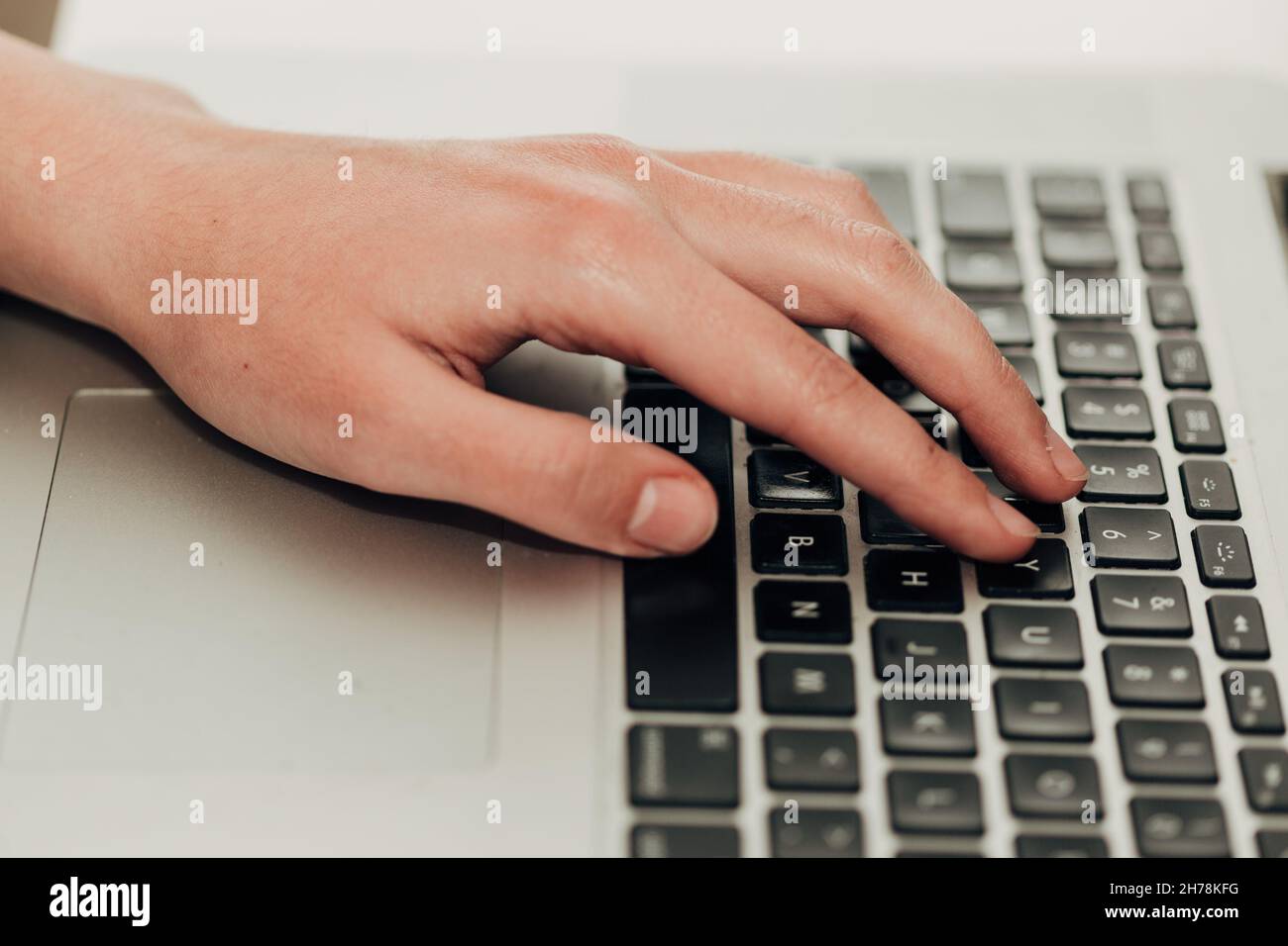 Close-Up Shot of Human Hands Placed Over Laptop Stock Photo - Alamy