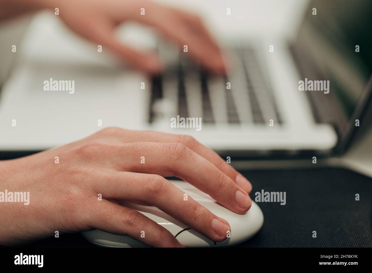 Close-Up Shot of Human Hands Placed Over Laptop Stock Photo - Alamy