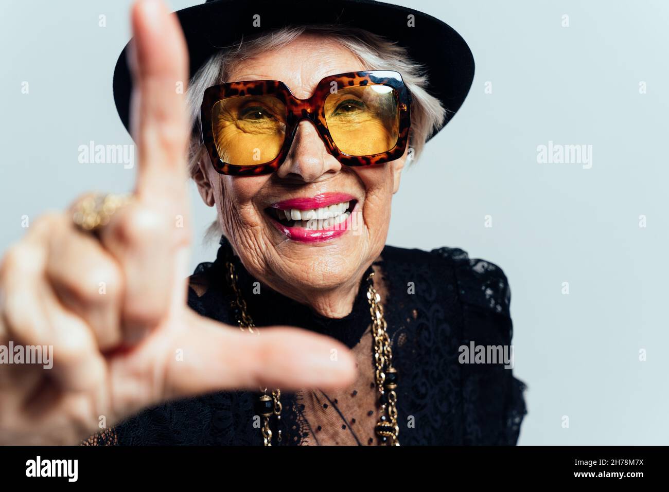 image of a beautiful and elegant old influencer woman. Cool grandmother ...