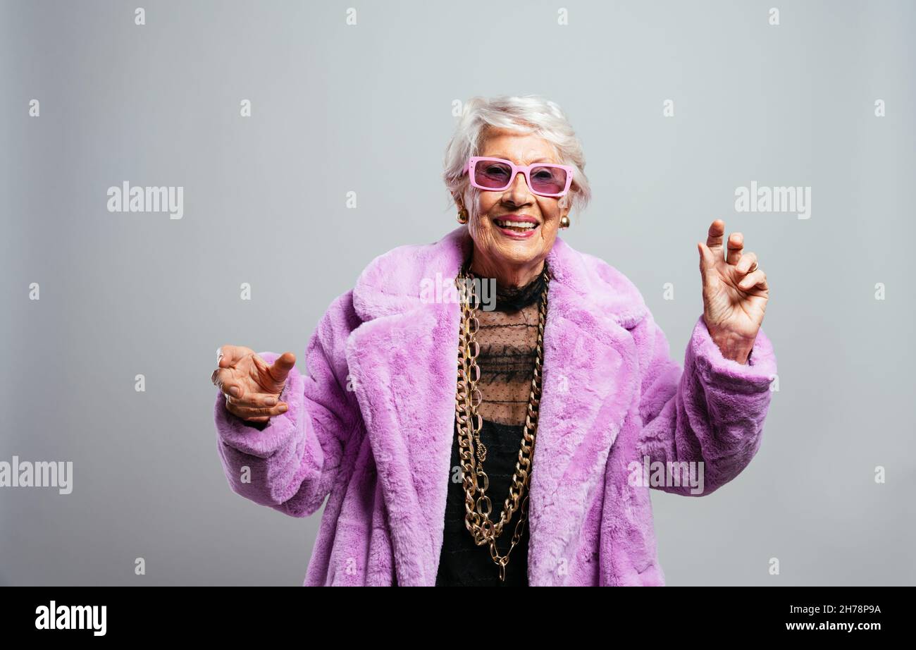 image of a beautiful and elegant old influencer woman. Cool grandmother ...